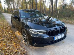 Black BMW 520 2021 in Ogre, with an engine capacity of 2.00 L and mileage of 122 thousand km for 30900 €, photo 1 on AUTOMOTO.COM.LV