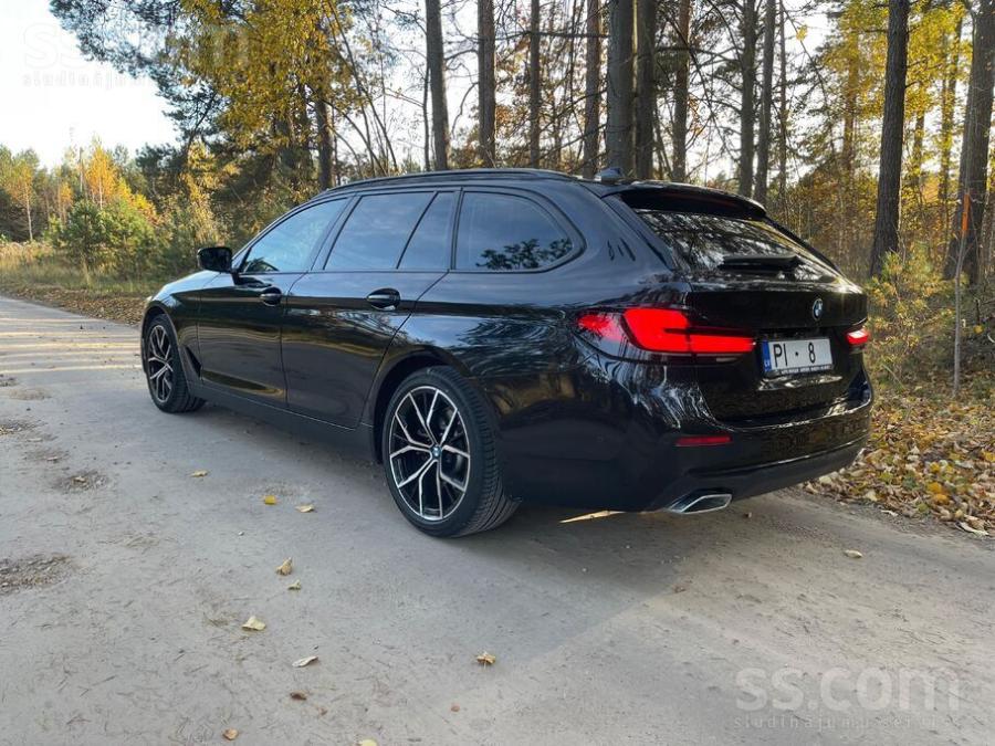 Black BMW 520 2021 in Ogre, with an engine capacity of 2.00 L and mileage of 122 thousand km for 30900 €, photo 4 on AUTOMOTO.COM.LV