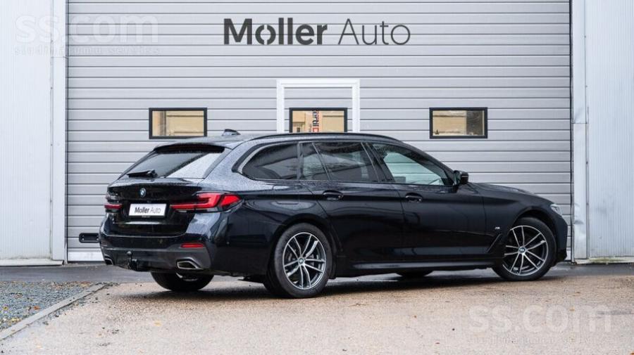 Black BMW 520 2021 in Jelgava, with an engine capacity of 2.00 L and mileage of 159 thousand km for 27950 €, photo 4 on AUTOMOTO.COM.LV