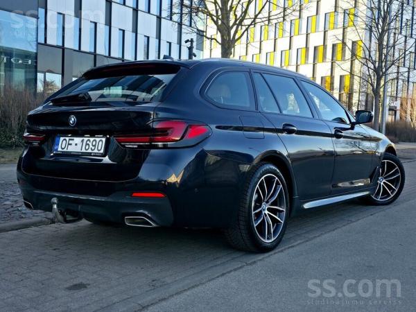Black BMW 520 2021 in Riga, with an engine capacity of 2.00 L and mileage of 160 thousand km for 23490 €, photo 6 on AUTOMOTO.COM.LV