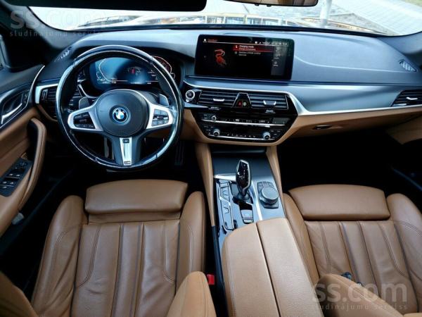 Black BMW 520 2021 in Riga, with an engine capacity of 2.00 L and mileage of 160 thousand km for 23490 €, photo 10 on AUTOMOTO.COM.LV
