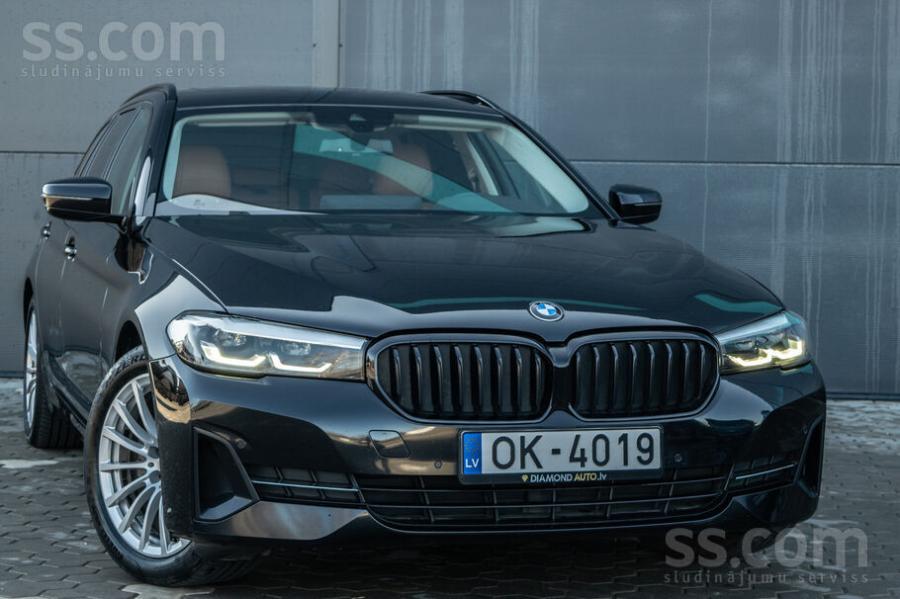 Black BMW 520 2021 in Riga, with an engine capacity of 2.00 L and mileage of 207 thousand km for 22870 €, photo 1 on AUTOMOTO.COM.LV