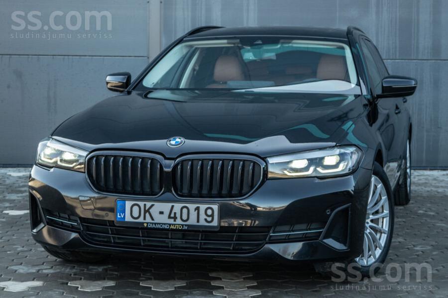 Black BMW 520 2021 in Riga, with an engine capacity of 2.00 L and mileage of 207 thousand km for 22870 €, photo 4 on AUTOMOTO.COM.LV