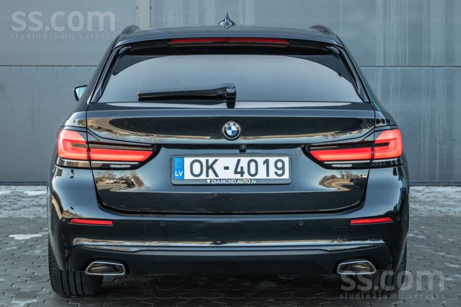 Black BMW 520 2021 in Riga, with an engine capacity of 2.00 L and mileage of 207 thousand km for 22870 €, photo 6 on AUTOMOTO.COM.LV