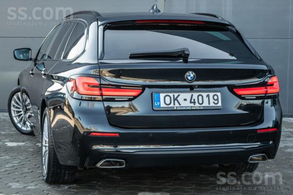 Black BMW 520 2021 in Riga, with an engine capacity of 2.00 L and mileage of 207 thousand km for 22870 €, photo 6 on AUTOMOTO.COM.LV