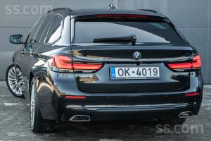 Black BMW 520 2021 in Riga, with an engine capacity of 2.00 L and mileage of 207 thousand km for 22870 €, photo 7 on AUTOMOTO.COM.LV