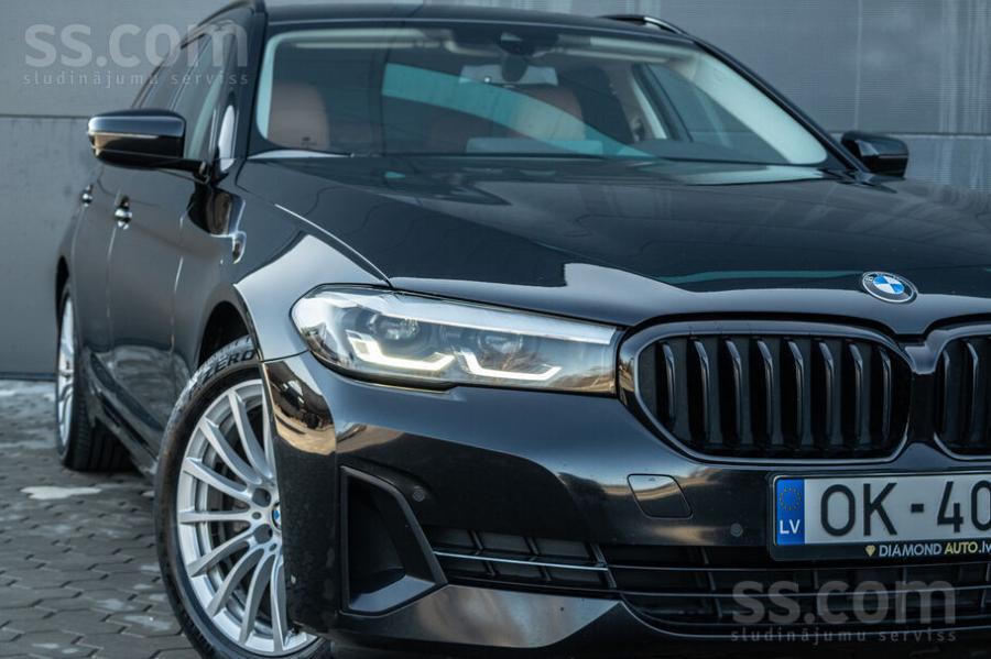 Black BMW 520 2021 in Riga, with an engine capacity of 2.00 L and mileage of 207 thousand km for 22870 €, photo 10 on AUTOMOTO.COM.LV