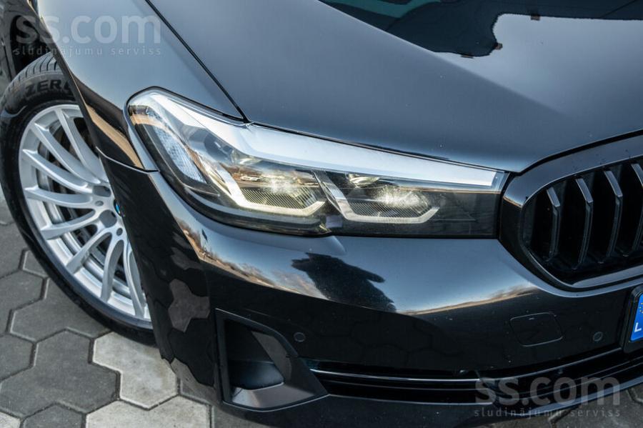 Black BMW 520 2021 in Riga, with an engine capacity of 2.00 L and mileage of 207 thousand km for 22870 €, photo 11 on AUTOMOTO.COM.LV