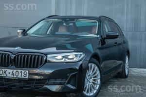 Black BMW 520 2021 in Riga, with an engine capacity of 2.00 L and mileage of 207 thousand km for 22870 €, photo 12 on AUTOMOTO.COM.LV