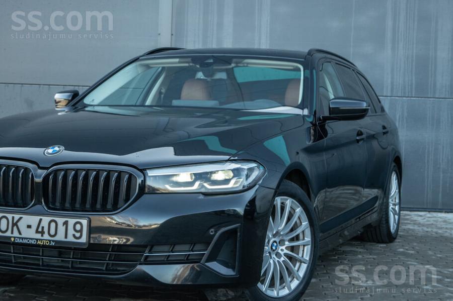 Black BMW 520 2021 in Riga, with an engine capacity of 2.00 L and mileage of 207 thousand km for 22870 €, photo 12 on AUTOMOTO.COM.LV