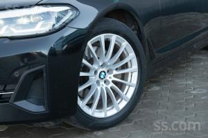 Black BMW 520 2021 in Riga, with an engine capacity of 2.00 L and mileage of 207 thousand km for 22870 €, photo 13 on AUTOMOTO.COM.LV