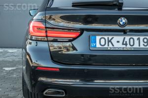 Black BMW 520 2021 in Riga, with an engine capacity of 2.00 L and mileage of 207 thousand km for 22870 €, photo 14 on AUTOMOTO.COM.LV
