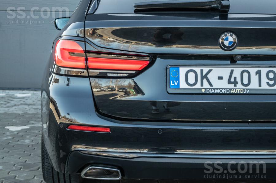Black BMW 520 2021 in Riga, with an engine capacity of 2.00 L and mileage of 207 thousand km for 22870 €, photo 14 on AUTOMOTO.COM.LV