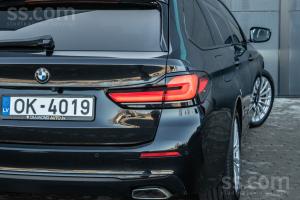 Black BMW 520 2021 in Riga, with an engine capacity of 2.00 L and mileage of 207 thousand km for 22870 €, photo 15 on AUTOMOTO.COM.LV