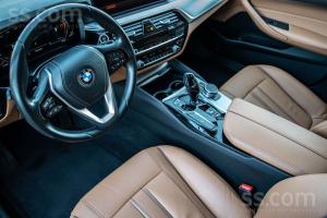 Black BMW 520 2021 in Riga, with an engine capacity of 2.00 L and mileage of 207 thousand km for 22870 €, photo 16 on AUTOMOTO.COM.LV