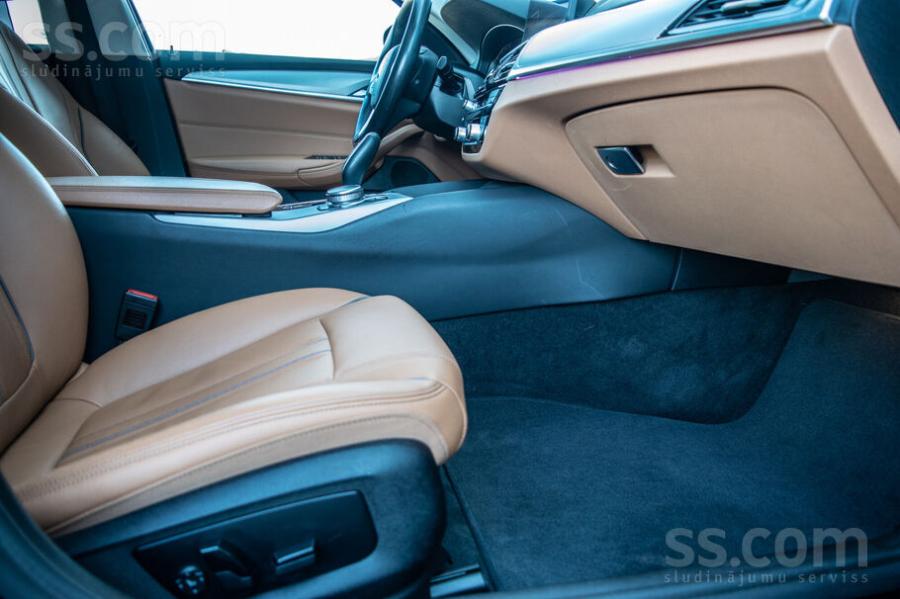 Black BMW 520 2021 in Riga, with an engine capacity of 2.00 L and mileage of 207 thousand km for 22870 €, photo 29 on AUTOMOTO.COM.LV