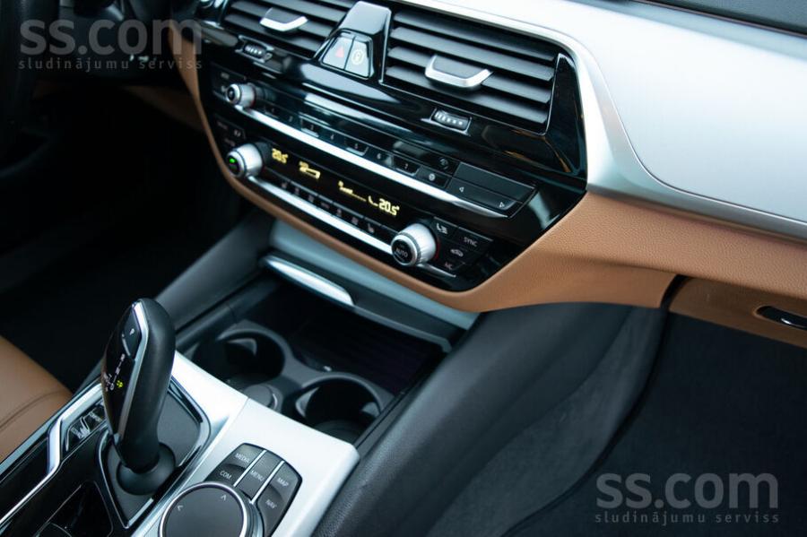 Black BMW 520 2021 in Riga, with an engine capacity of 2.00 L and mileage of 207 thousand km for 22870 €, photo 31 on AUTOMOTO.COM.LV