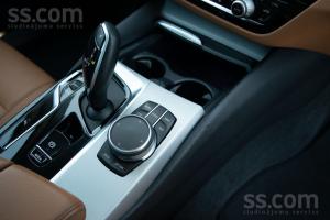 Black BMW 520 2021 in Riga, with an engine capacity of 2.00 L and mileage of 207 thousand km for 22870 €, photo 32 on AUTOMOTO.COM.LV