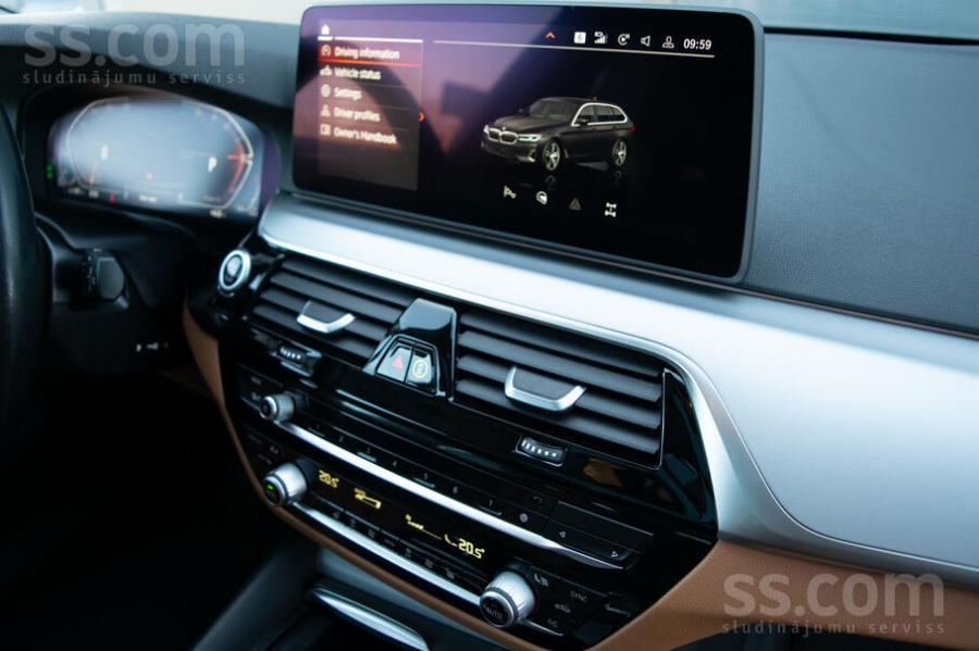 Black BMW 520 2021 in Riga, with an engine capacity of 2.00 L and mileage of 207 thousand km for 22870 €, photo 33 on AUTOMOTO.COM.LV