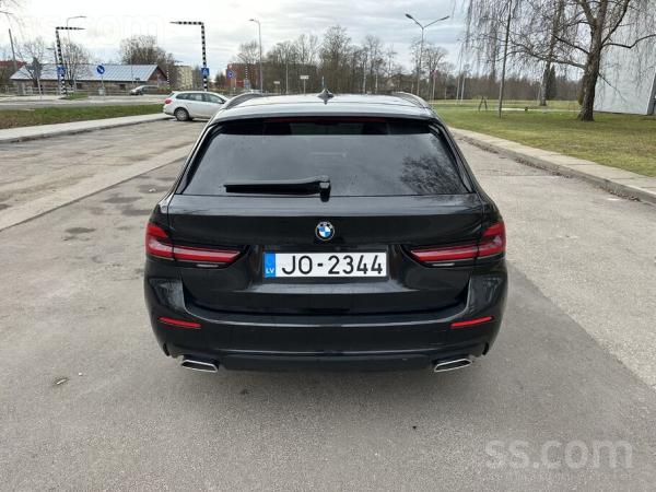 Black BMW 520 2021 in Valmiera, with an engine capacity of 2.00 L and mileage of 166 thousand km for 23000 €, photo 4 on AUTOMOTO.COM.LV