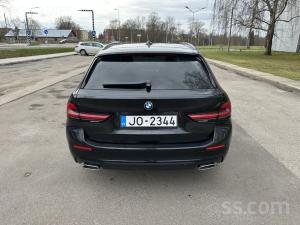 Black BMW 520 2021 in Valmiera, with an engine capacity of 2.00 L and mileage of 166 thousand km for 23000 €, photo 5 on AUTOMOTO.COM.LV