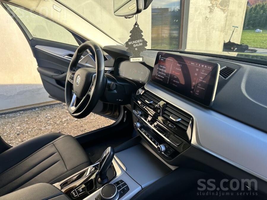 Black BMW 520 2021 in Valmiera, with an engine capacity of 2.00 L and mileage of 166 thousand km for 23000 €, photo 7 on AUTOMOTO.COM.LV