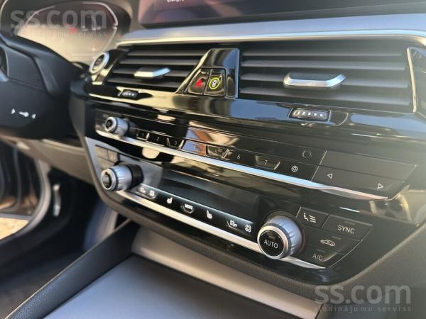 Black BMW 520 2021 in Valmiera, with an engine capacity of 2.00 L and mileage of 166 thousand km for 23000 €, photo 8 on AUTOMOTO.COM.LV