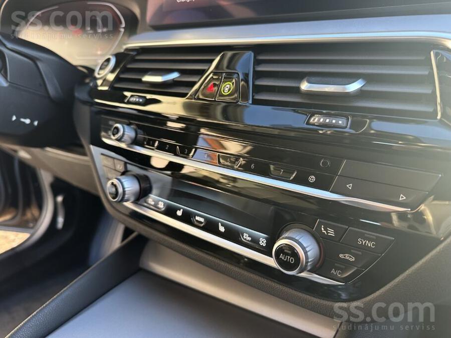 Black BMW 520 2021 in Valmiera, with an engine capacity of 2.00 L and mileage of 166 thousand km for 23000 €, photo 9 on AUTOMOTO.COM.LV