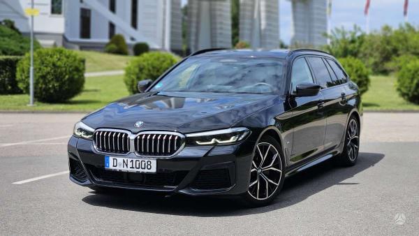 Melns BMW 520 2021 Elektrėnai, ar dzinēja tilpumu 2.00 L un nobraukumu 192 tūkst. km par 24990 €, foto  vietnē AUTOMOTO.COM.LV