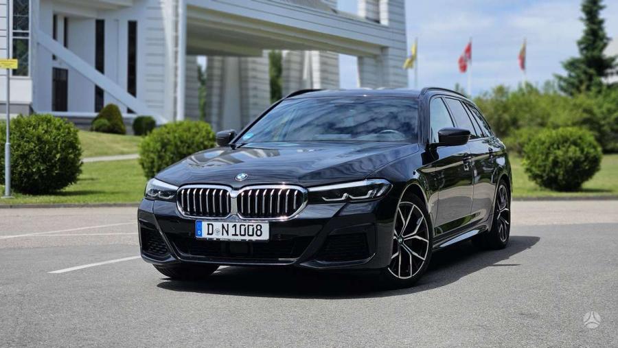 Black BMW 520 2021 in Elektrenai, with an engine capacity of 2.00 L and mileage of 192 thousand km for 24990 €, photo 3 on AUTOMOTO.COM.LV