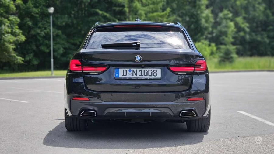 Black BMW 520 2021 in Elektrenai, with an engine capacity of 2.00 L and mileage of 192 thousand km for 24990 €, photo 7 on AUTOMOTO.COM.LV