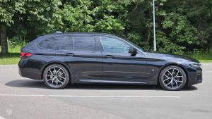Black BMW 520 2021 in Elektrenai, with an engine capacity of 2.00 L and mileage of 192 thousand km for 24990 €, photo 10 on AUTOMOTO.COM.LV