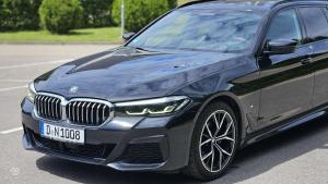 Black BMW 520 2021 in Elektrenai, with an engine capacity of 2.00 L and mileage of 192 thousand km for 24990 €, photo 12 on AUTOMOTO.COM.LV