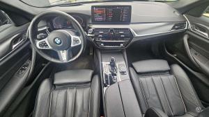 Black BMW 520 2021 in Elektrenai, with an engine capacity of 2.00 L and mileage of 192 thousand km for 24990 €, photo 15 on AUTOMOTO.COM.LV