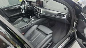 Black BMW 520 2021 in Elektrenai, with an engine capacity of 2.00 L and mileage of 192 thousand km for 24990 €, photo 16 on AUTOMOTO.COM.LV