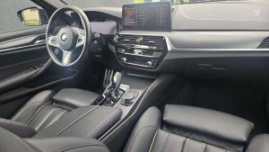 Black BMW 520 2021 in Elektrenai, with an engine capacity of 2.00 L and mileage of 192 thousand km for 24990 €, photo 18 on AUTOMOTO.COM.LV