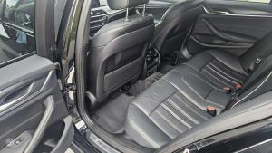 Black BMW 520 2021 in Elektrenai, with an engine capacity of 2.00 L and mileage of 192 thousand km for 24990 €, photo 19 on AUTOMOTO.COM.LV