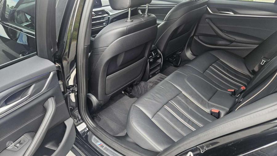 Black BMW 520 2021 in Elektrenai, with an engine capacity of 2.00 L and mileage of 192 thousand km for 24990 €, photo 19 on AUTOMOTO.COM.LV