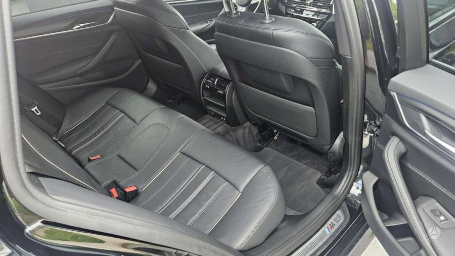 Black BMW 520 2021 in Elektrenai, with an engine capacity of 2.00 L and mileage of 192 thousand km for 24990 €, photo 20 on AUTOMOTO.COM.LV