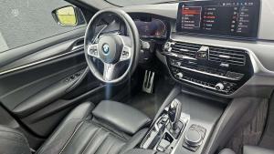 Black BMW 520 2021 in Elektrenai, with an engine capacity of 2.00 L and mileage of 192 thousand km for 24990 €, photo 21 on AUTOMOTO.COM.LV