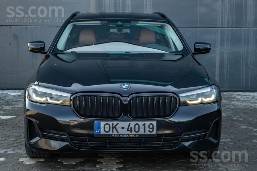 Black BMW 520 2021 in Riga, with an engine capacity of 2.00 L and mileage of 207 thousand km for 22000 €, photo 3 on AUTOMOTO.COM.LV