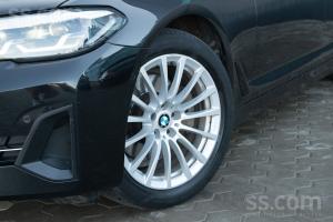 Black BMW 520 2021 in Riga, with an engine capacity of 2.00 L and mileage of 207 thousand km for 22000 €, photo 13 on AUTOMOTO.COM.LV