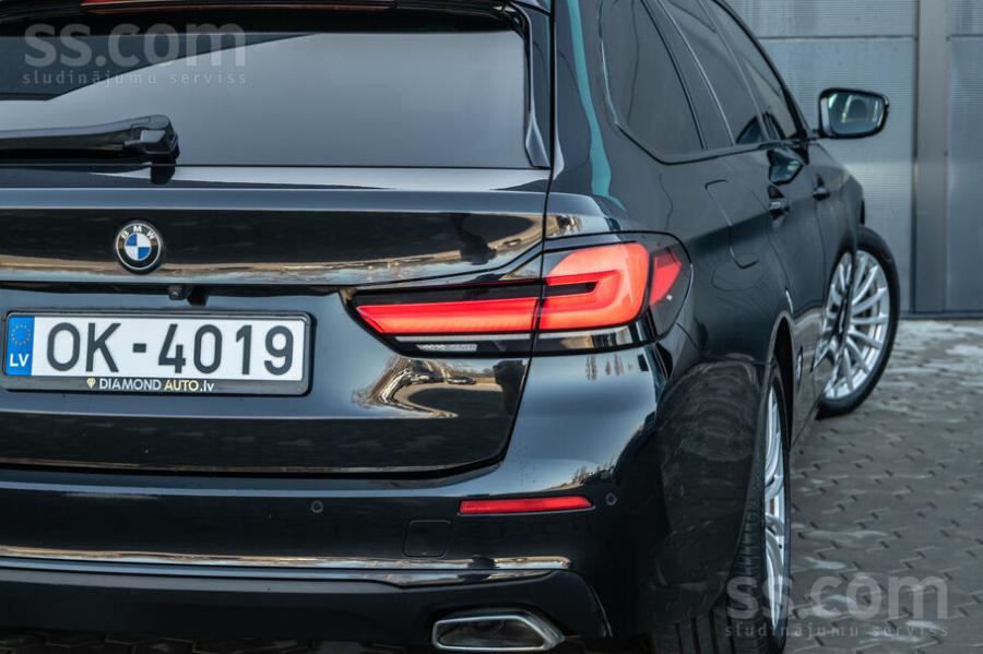 Black BMW 520 2021 in Riga, with an engine capacity of 2.00 L and mileage of 207 thousand km for 22000 €, photo 15 on AUTOMOTO.COM.LV