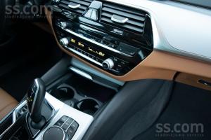 Black BMW 520 2021 in Riga, with an engine capacity of 2.00 L and mileage of 207 thousand km for 22000 €, photo 31 on AUTOMOTO.COM.LV