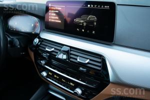 Black BMW 520 2021 in Riga, with an engine capacity of 2.00 L and mileage of 207 thousand km for 22000 €, photo 33 on AUTOMOTO.COM.LV