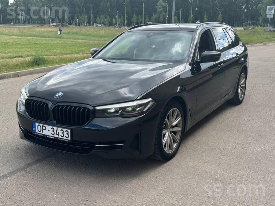Black BMW 520 2021 in Riga, with an engine capacity of 2.00 L and mileage of 209 thousand km for 24000 €, photo 1 on AUTOMOTO.COM.LV
