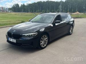 Black BMW 520 2021 in Riga, with an engine capacity of 2.00 L and mileage of 209 thousand km for 24000 €, photo 3 on AUTOMOTO.COM.LV