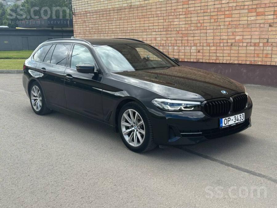 Black BMW 520 2021 in Riga, with an engine capacity of 2.00 L and mileage of 209 thousand km for 24000 €, photo 5 on AUTOMOTO.COM.LV
