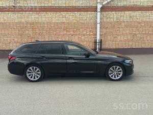 Black BMW 520 2021 in Riga, with an engine capacity of 2.00 L and mileage of 209 thousand km for 24000 €, photo 6 on AUTOMOTO.COM.LV