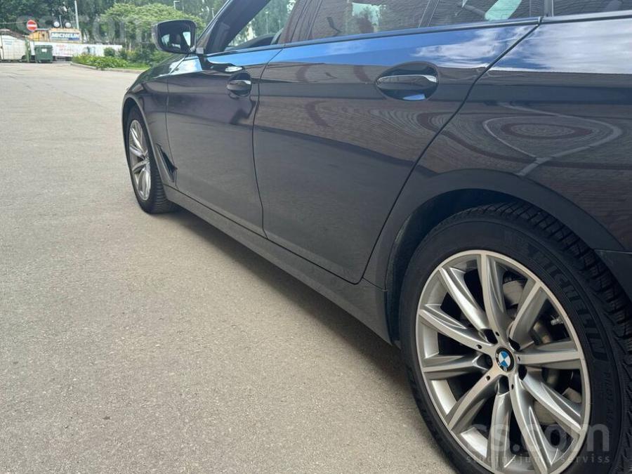 Black BMW 520 2021 in Riga, with an engine capacity of 2.00 L and mileage of 209 thousand km for 24000 €, photo 10 on AUTOMOTO.COM.LV